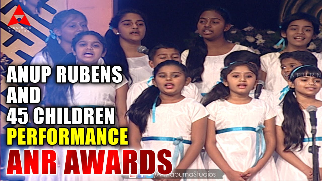 Anup Rubens and 45 Children Live Perform Manam Movie Song at ANR Awards ...
