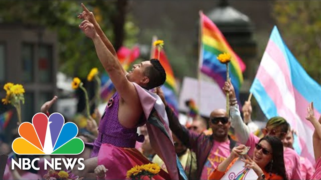 Thousands March In Pride Parades Across The Country - YouTube