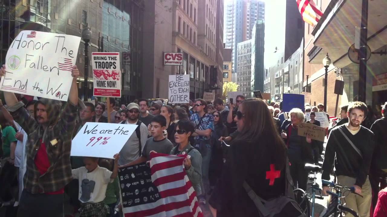 OCCUPY BOSTON marching through Downtown Boston on October 15th, 2011 ...