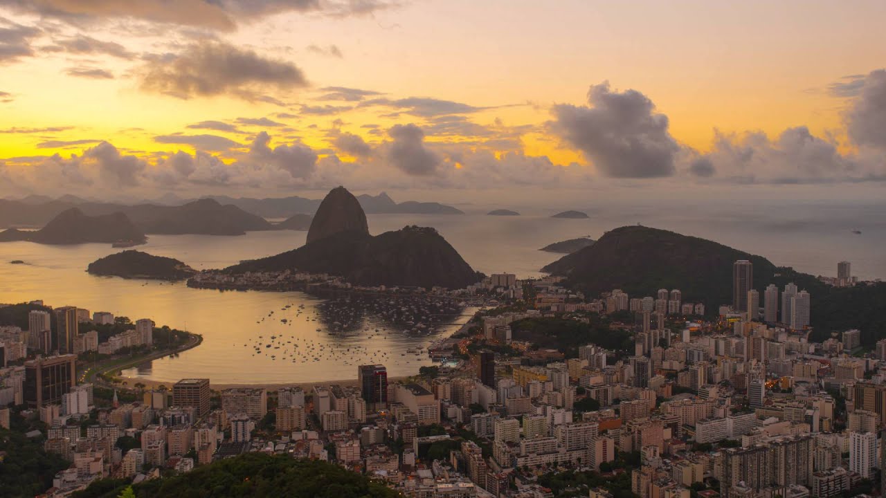 Sunrise time-lapse overlooking Rio de Janeiro and Sugarloaf Mountain ...