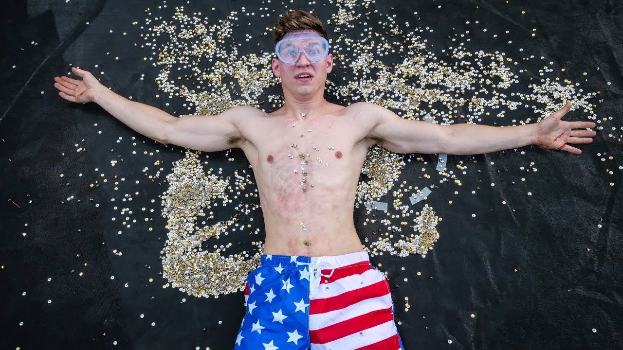 Jumping on 10,000+ thumbtacks on trampoline - YouTube