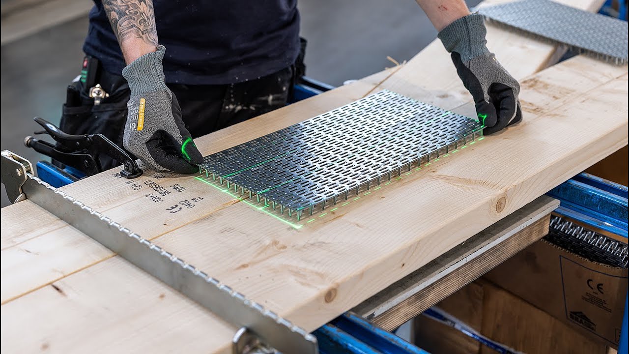 Laser projection streamlines NP Nilsson's roof truss production - YouTube