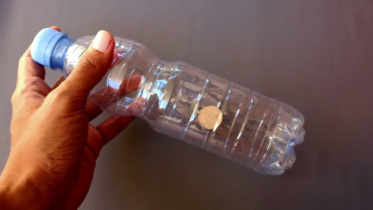 Tutorial Trik Sulap Memasukkan Uang Koin Dalam Botol Plastik - YouTube