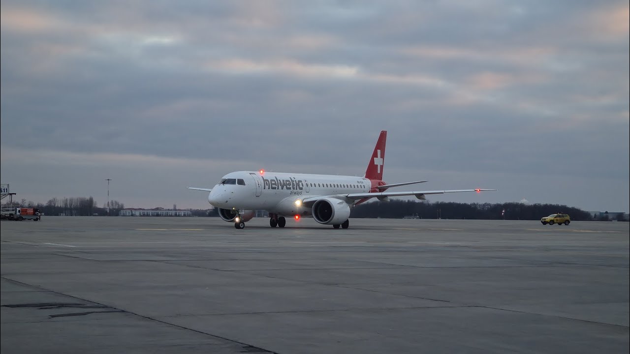 An Embraer E190-E2 starts its engines and heads for the runway - YouTube