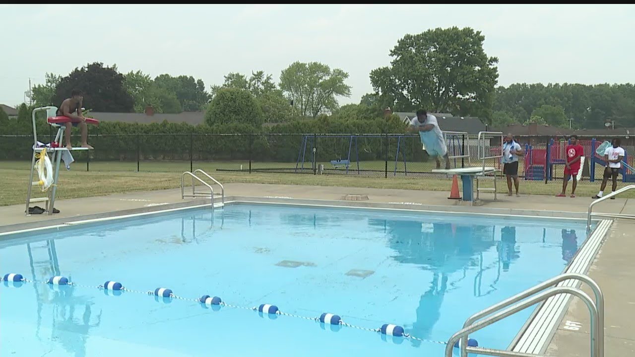 Local mayor takes annual dive ahead of city pool's opening day - YouTube