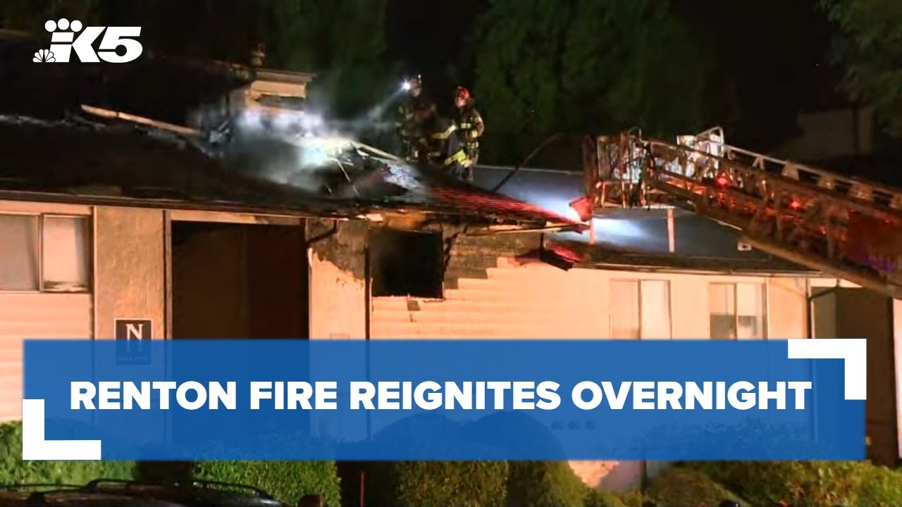 Renton fire that damaged 12 apartments, cars flares up overnight - YouTube