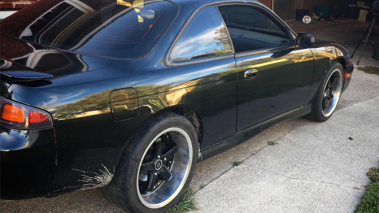 Trying on the new wheels! Car falls off jack - YouTube