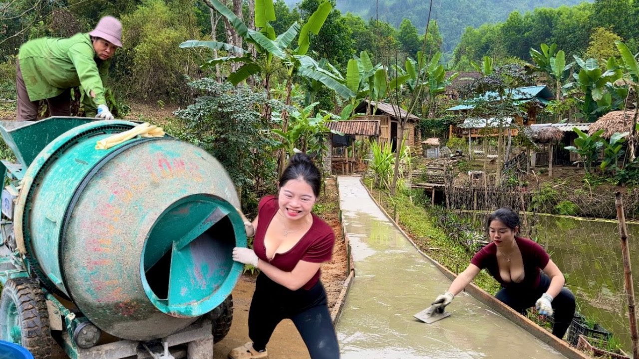 Genius girl uses a concrete mixer to pour concrete from the main road ...