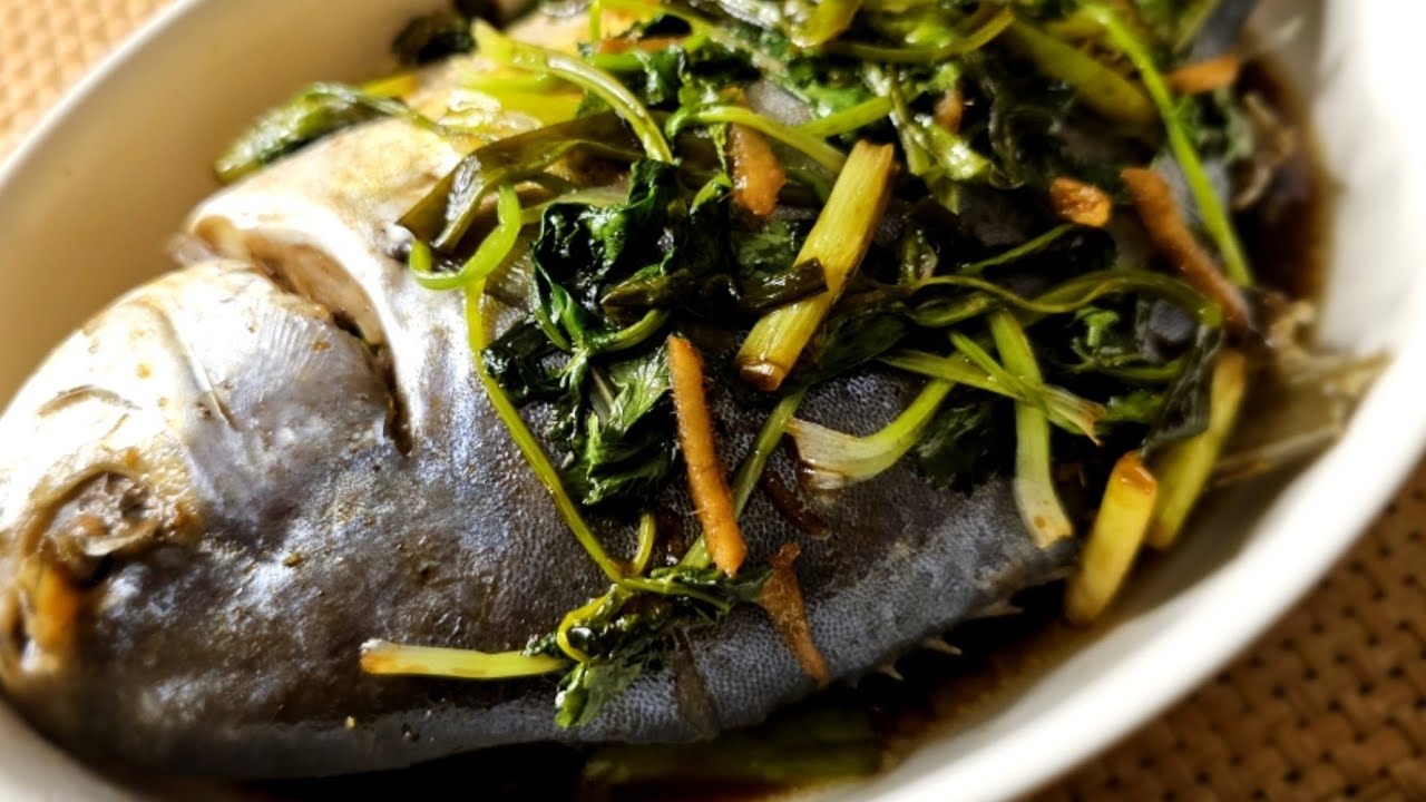 Steamed Fish Seasoned With A Simple Soy Sauce Along With Spring Onions ...