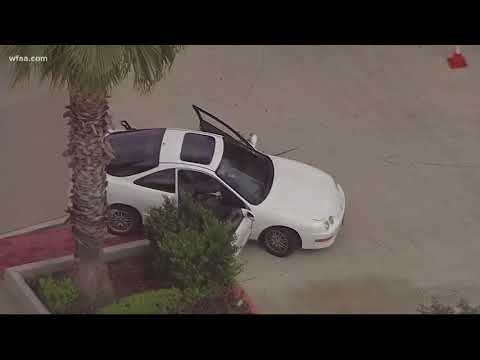 Suspect in stolen car hits two police officers