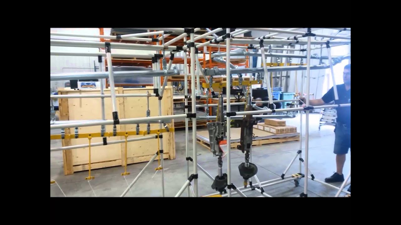 Monorail bump carts improve material handling systems | Flexpipe - YouTube