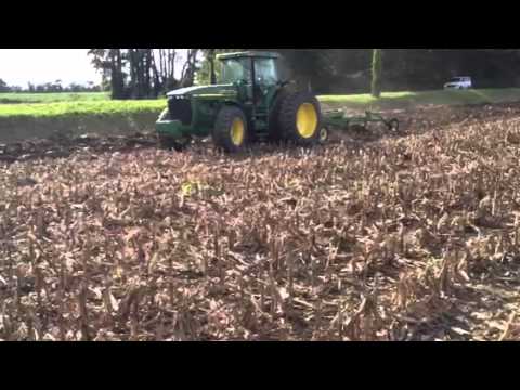 Six bottom switch plow in corn stalks - YouTube