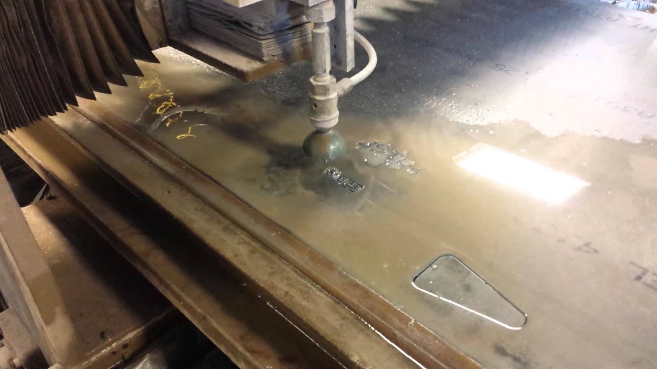 Water jet cutting trailing arms. - YouTube