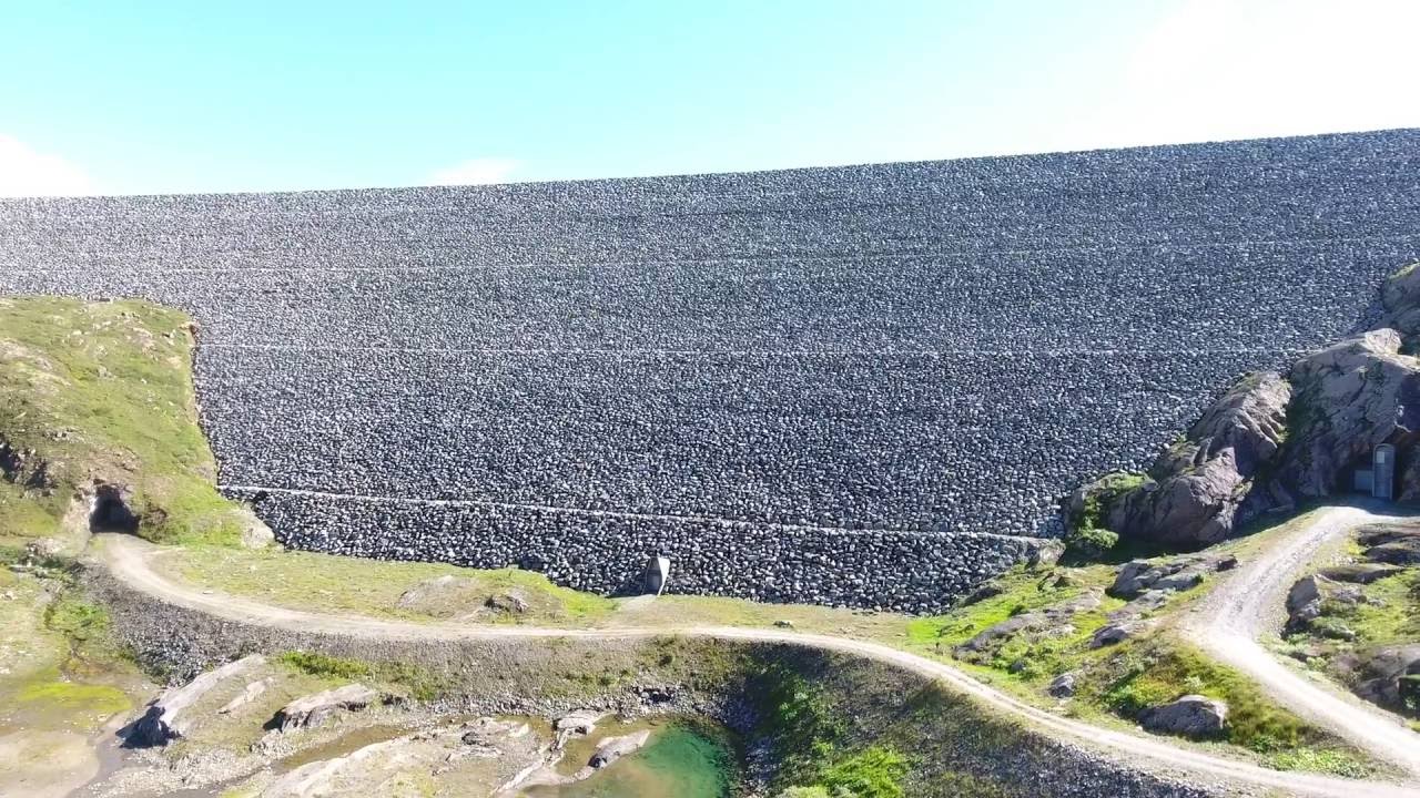 Must see! Giant stone dam. Storglomvatn. - YouTube
