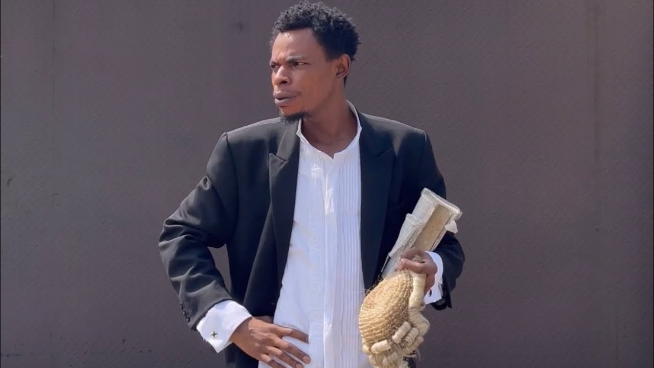 Professor Titus Lands in trouble with Big Grammar - YouTube