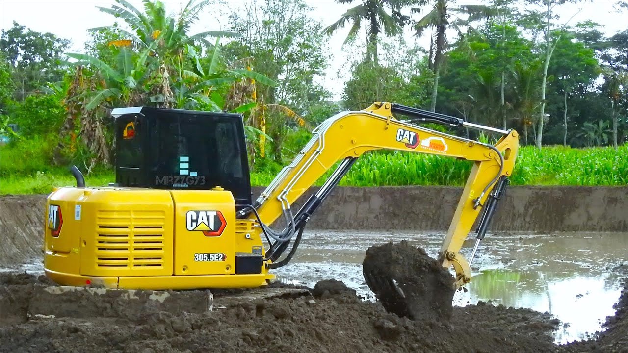 CAT 305 Mini Excavator Digging A Fish Pond - YouTube