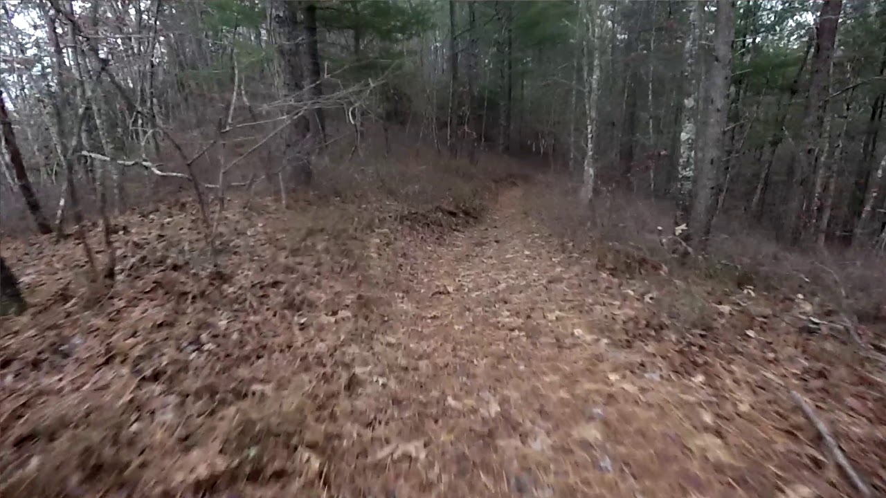 The steep descent from the Overlook at Tsali Left/Right Loop - YouTube