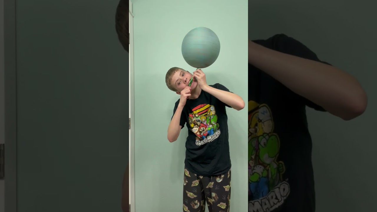 Spinning a basketball on a toothbrush held in my mouth - YouTube