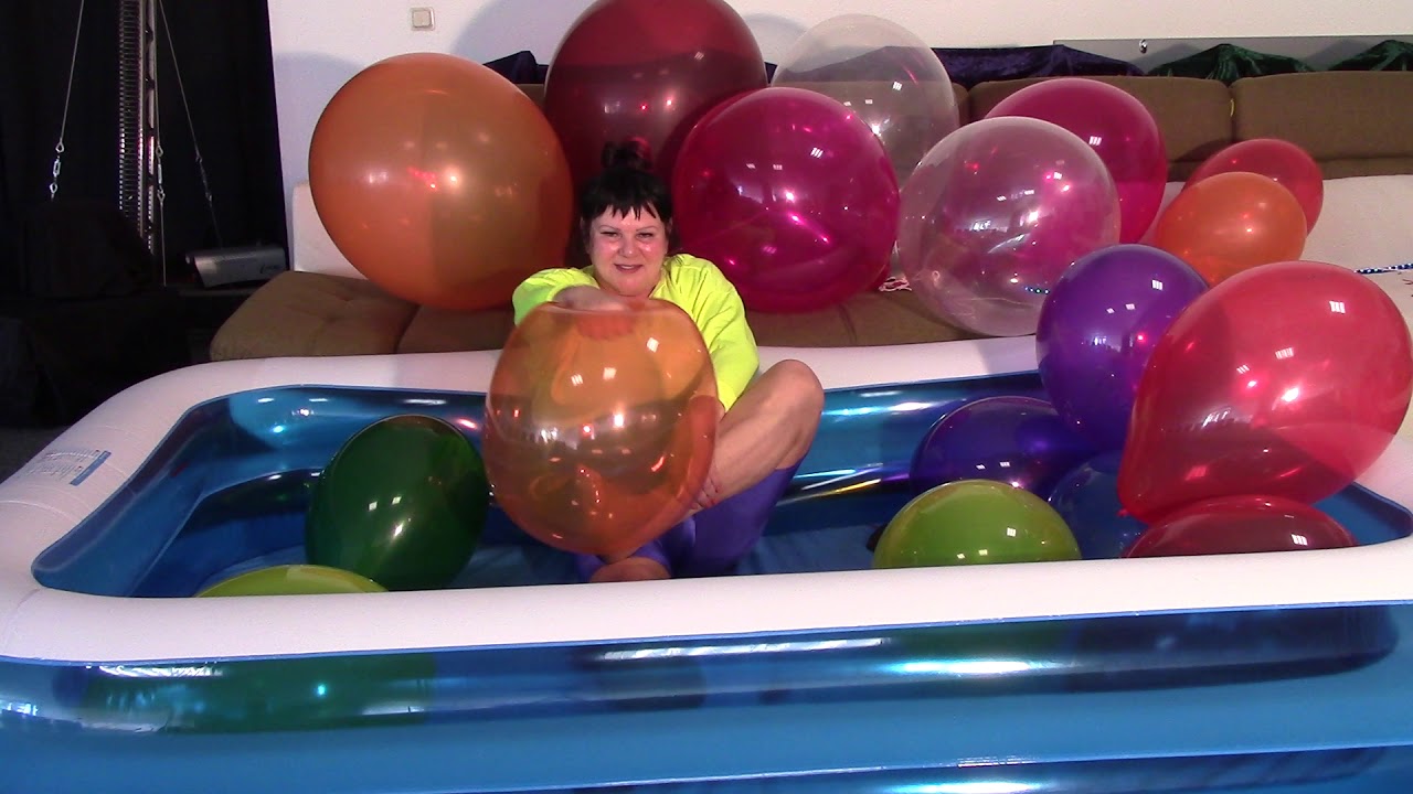 Popping the Balloons in my pool - YouTube