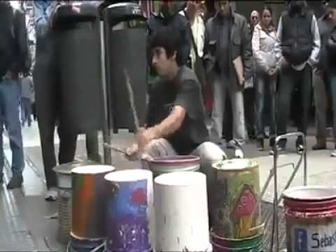 Amazing street drummer playing techno on buckets, pots - YouTube