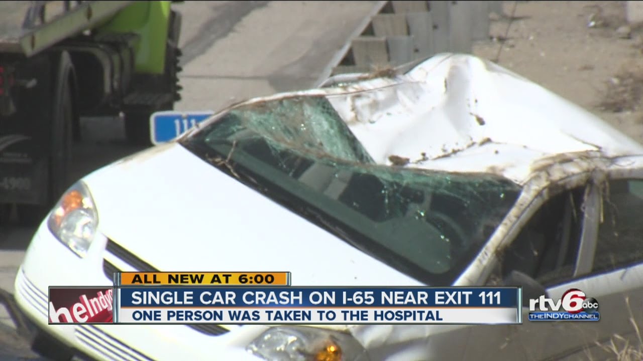 Car flips over guardrail on I-65 - YouTube