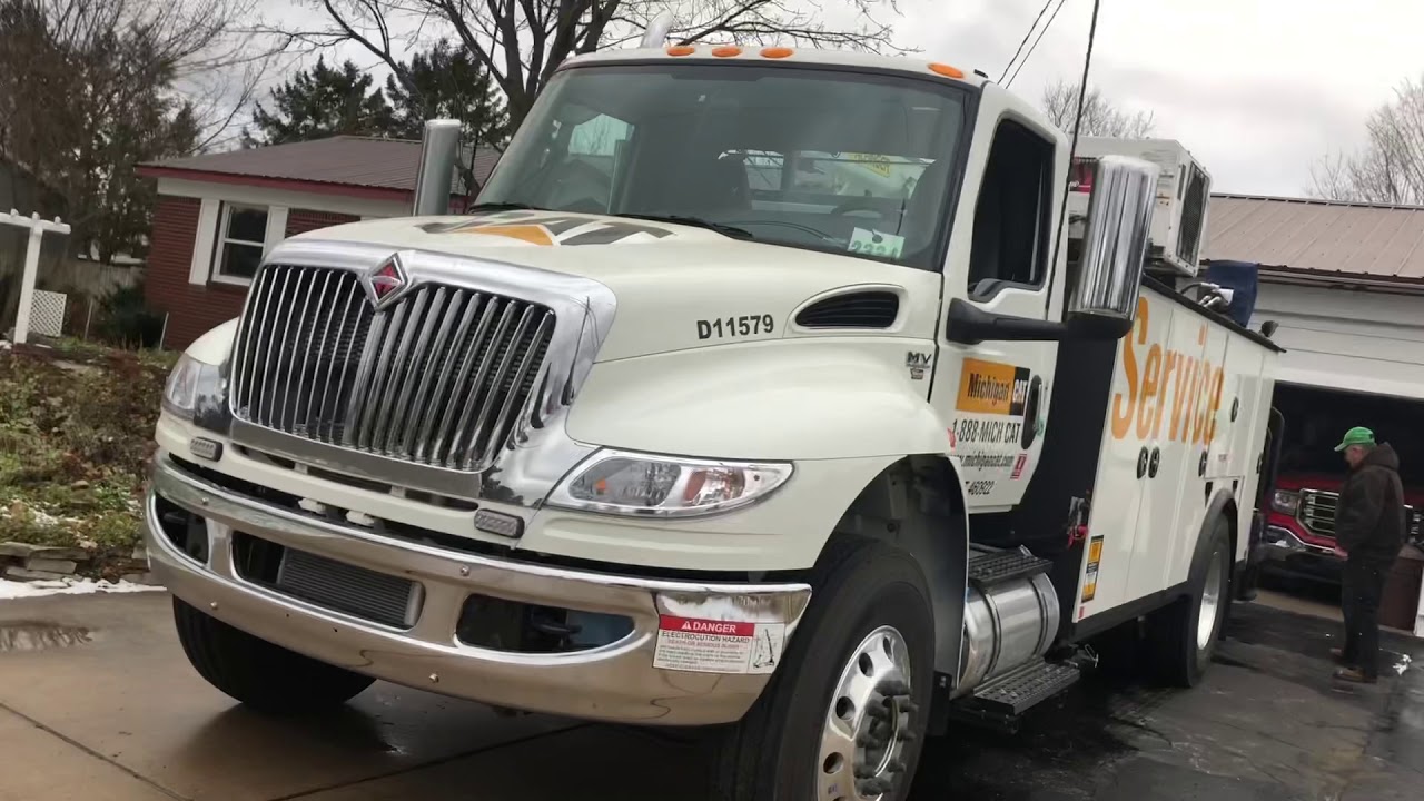 New CAT service truck in our driveway today and my model I built of the ...