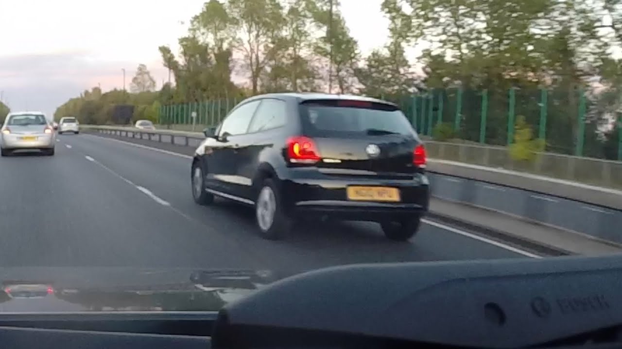 Driver cutting across two lanes in front of faster traffic. - YouTube