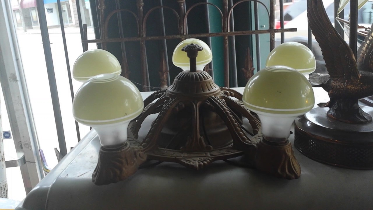Antique lamps and light fixtures in an antique store - YouTube