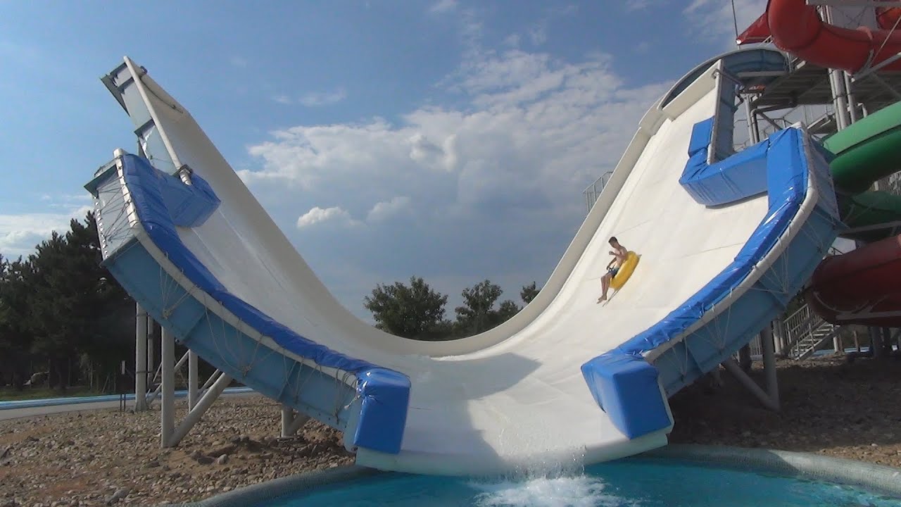 Swinging on the Pendulum Water Slide at AquaCentrum - YouTube
