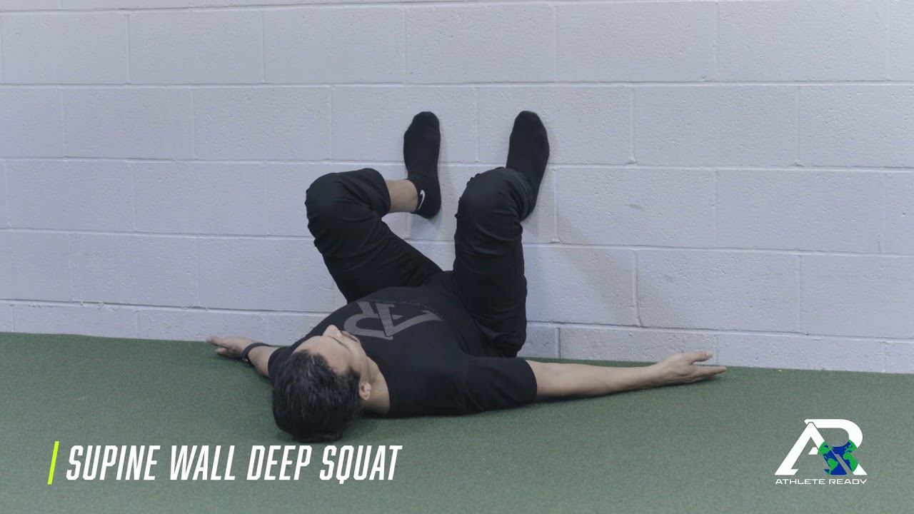 Supine Wall Deep Squat - YouTube