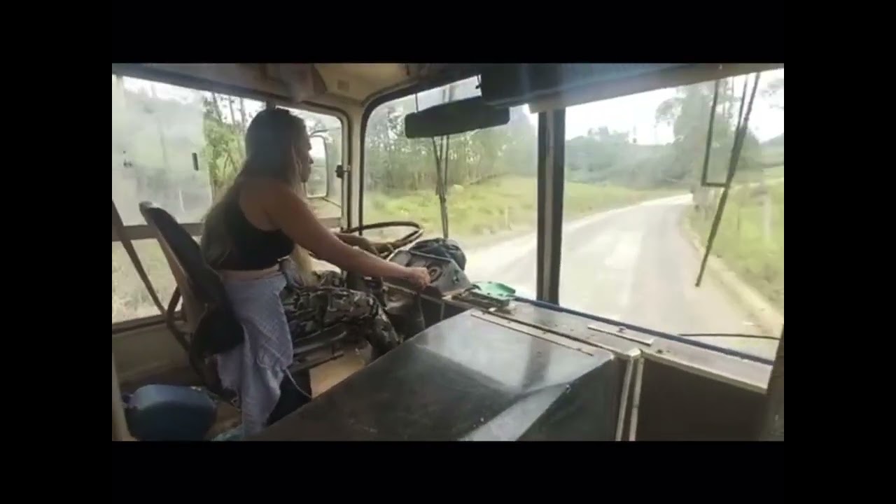 Woman driving big old bus. - YouTube
