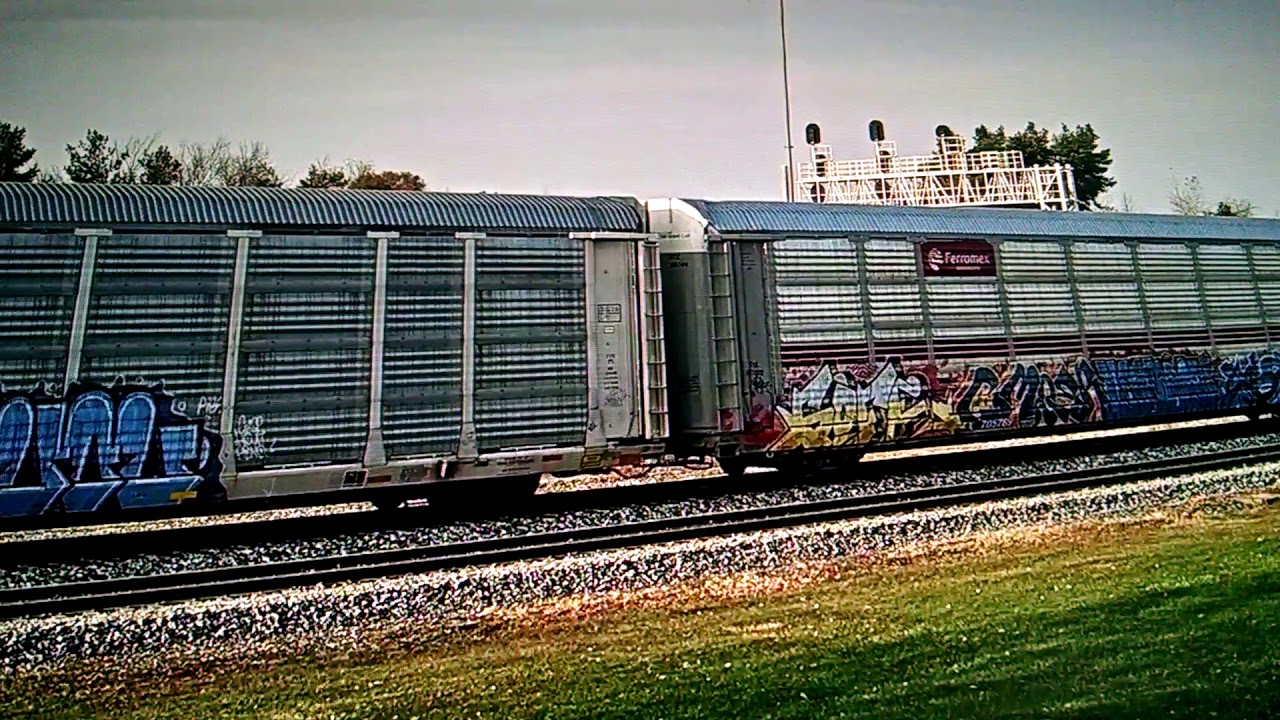 3 CSX sd40-3 emd engine's on a very long autorack train in Berea Ohio ...