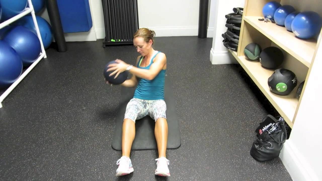 Seated weighted torso rotation. - YouTube