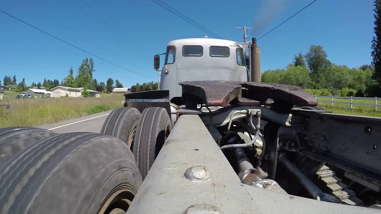 1950 GMC 970 onto the highway and pull the grade into town - YouTube