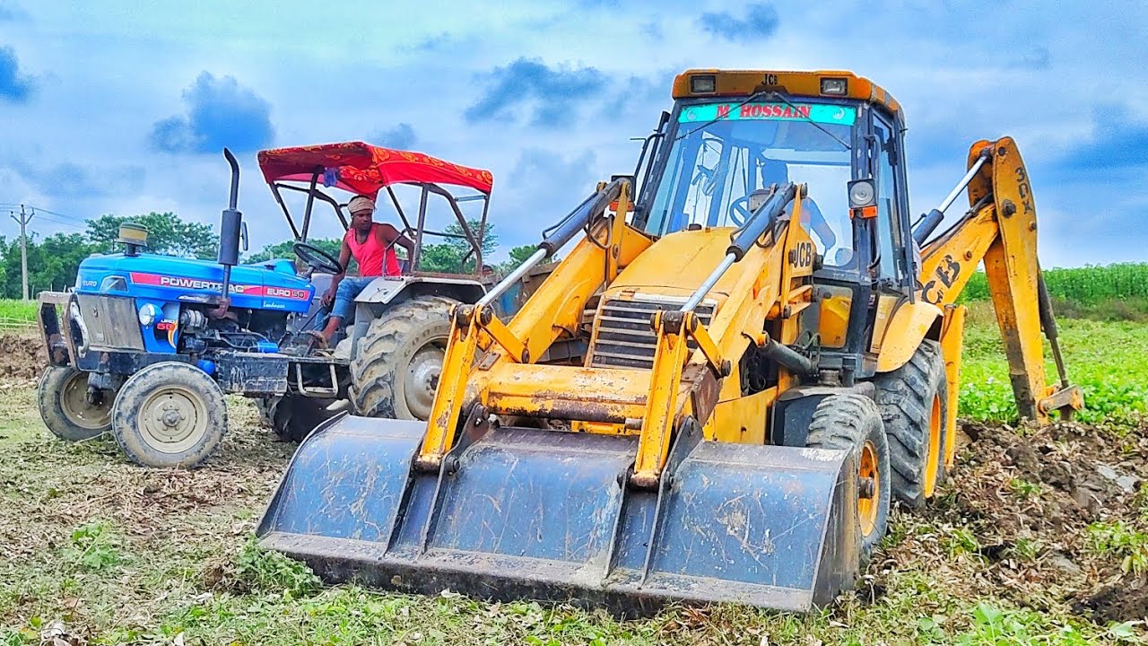 Jcb 3dx Backhoe Loader Machine Loading Red Mud In Mahindra and Swaraj ...