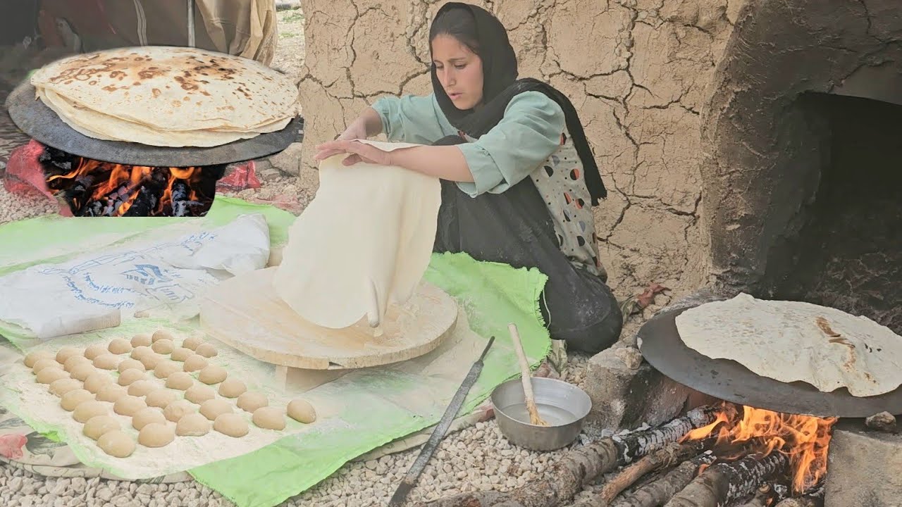 The hardworking hands of nomadic women; baking traditional bread in the ...