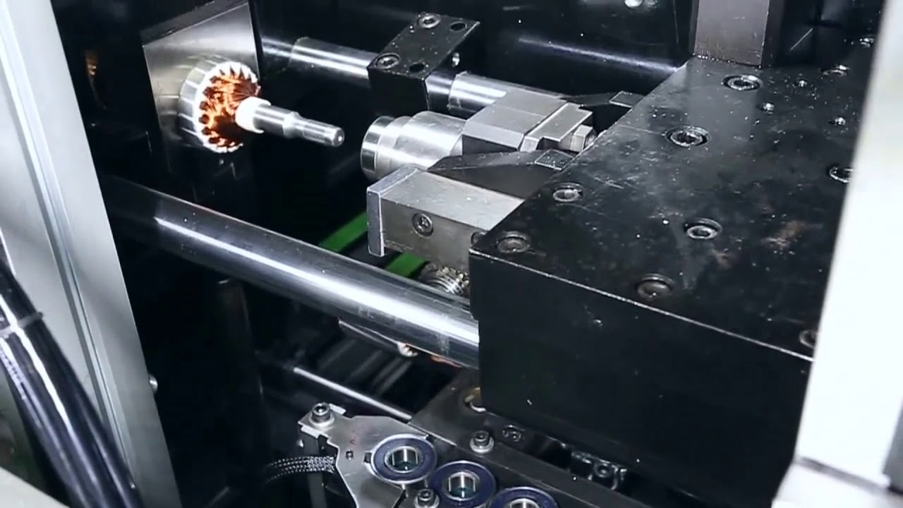rotor bearing automatic inserting machine - YouTube