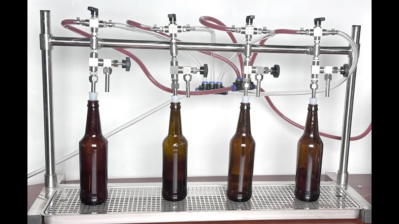Beer Counter Pressure Isobaric Bottle Filler 4 Heads - YouTube
