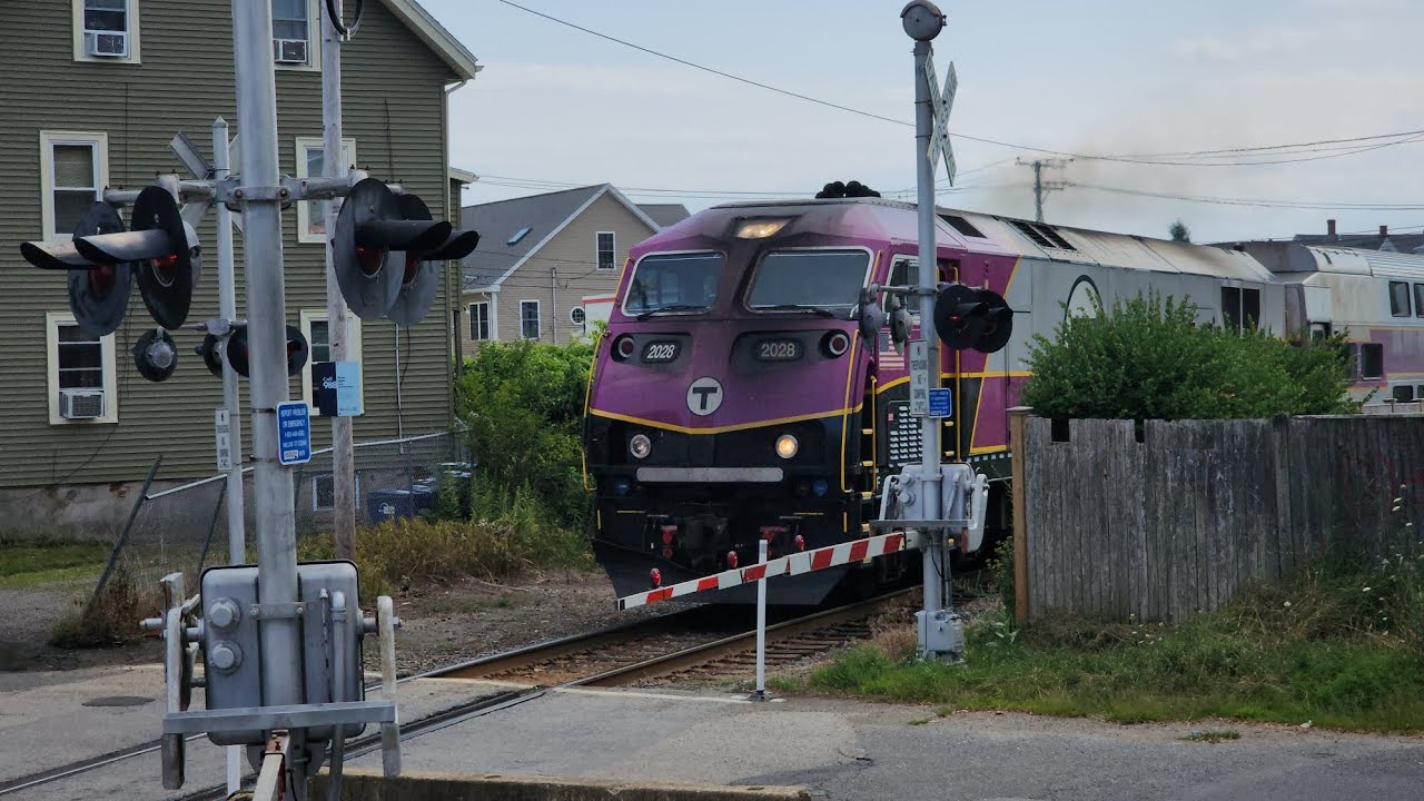Rockport bound Commuter Rail train crossing at Willow Street & Cedar ...