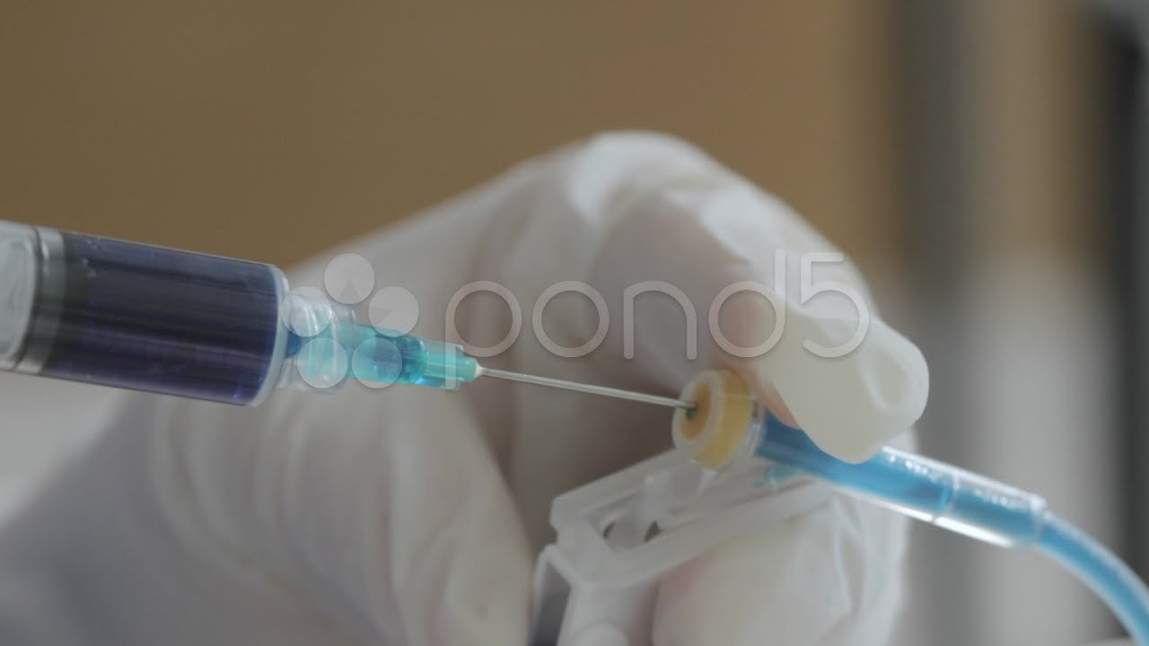 Injecting Blue Serum Into Iv (Hd). Stock Footage - YouTube