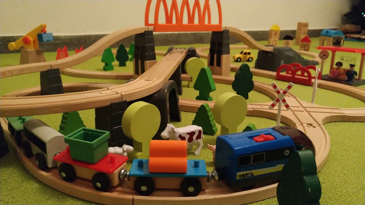 Wooden toy train layout with a three-level junction - YouTube