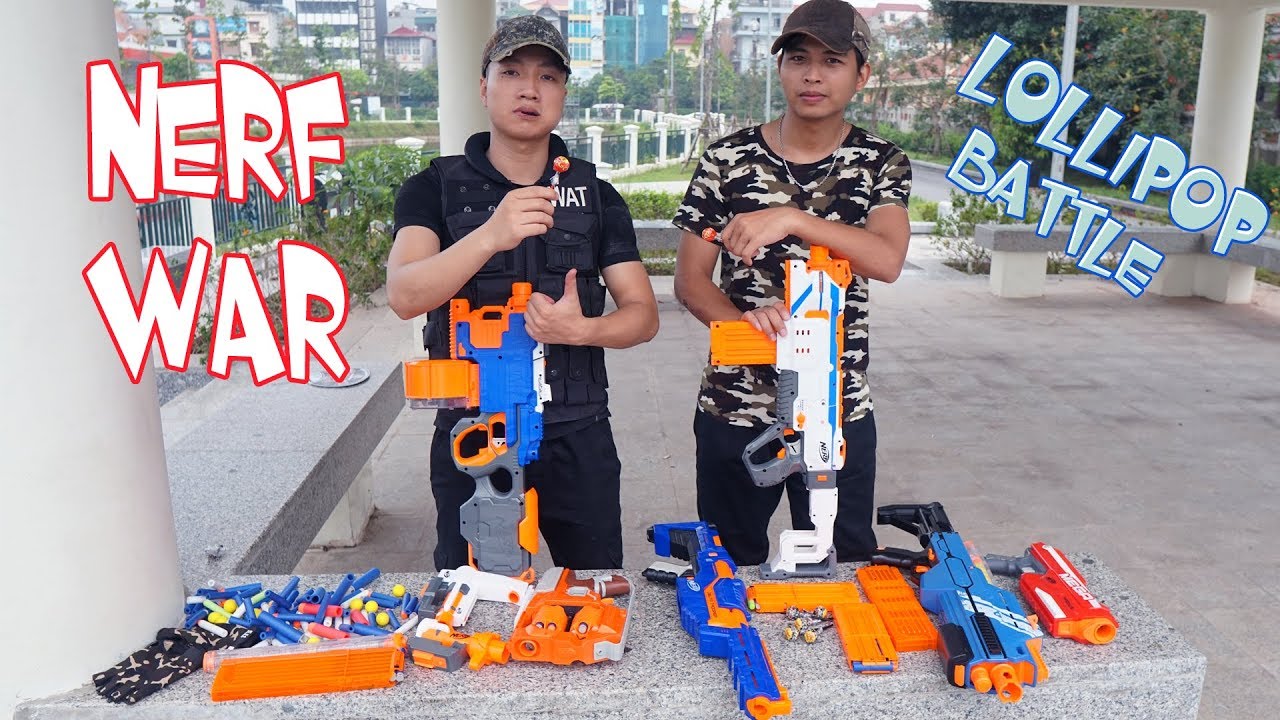 NERF GUN WAR LOLLIPOP BATTLE - YouTube