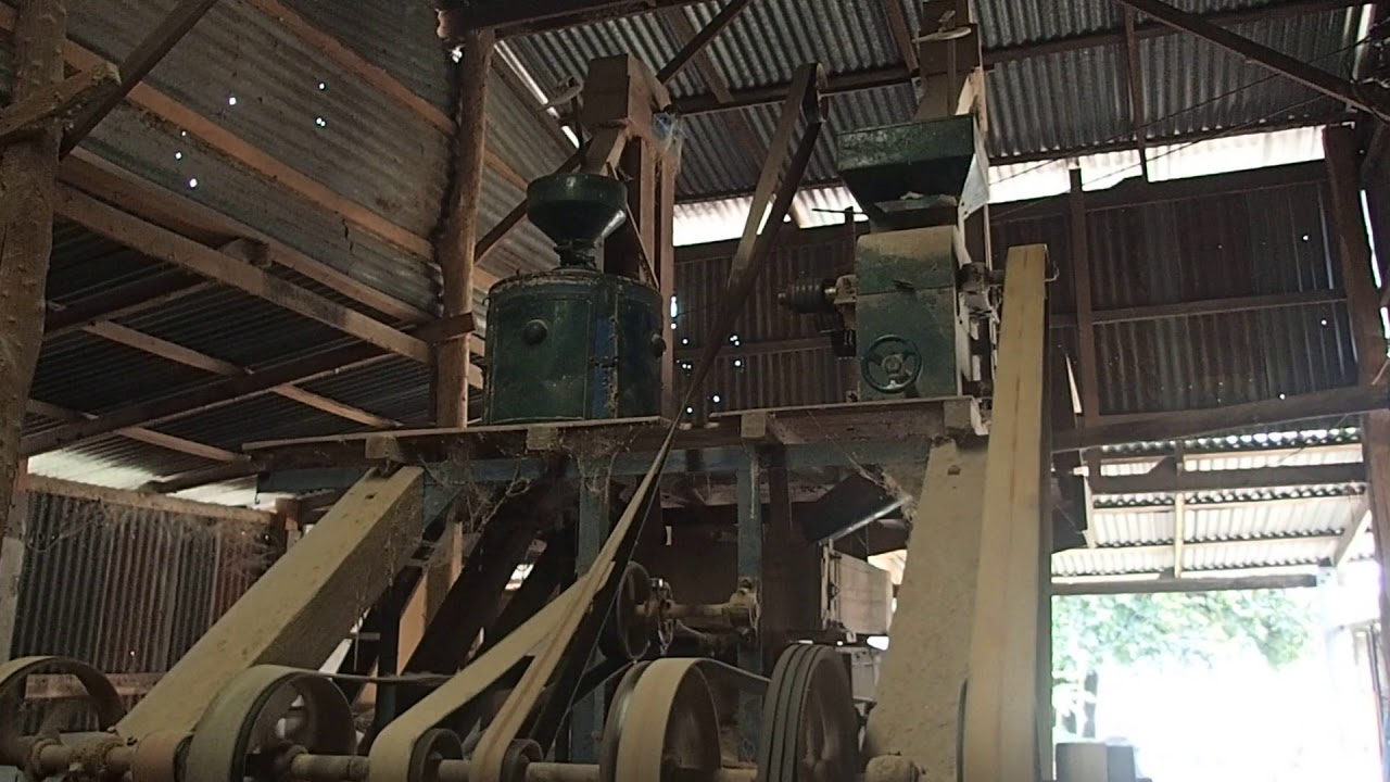 History: An Old Rice Mill Running On A Very Old Wooden Machine And ...