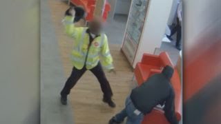 Watch security guard attack robber with helmet - YouTube