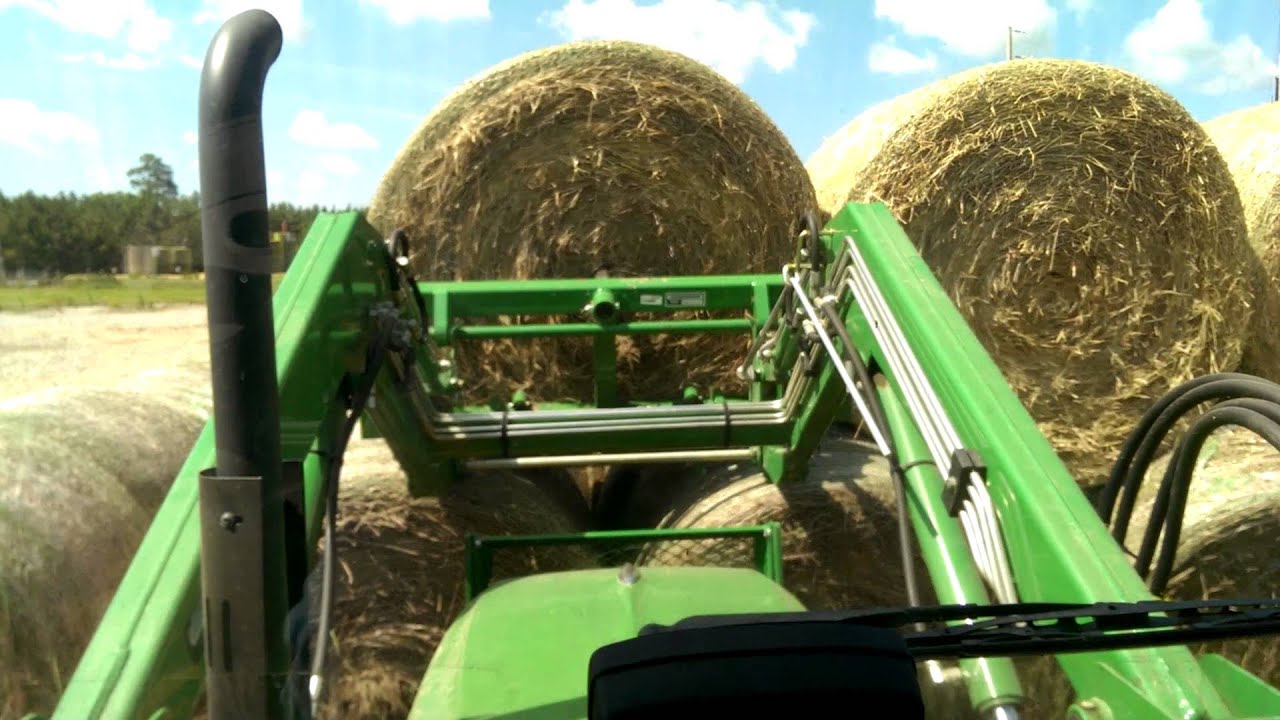 Stacking Hay with Spear John Deere Front End Loader - YouTube