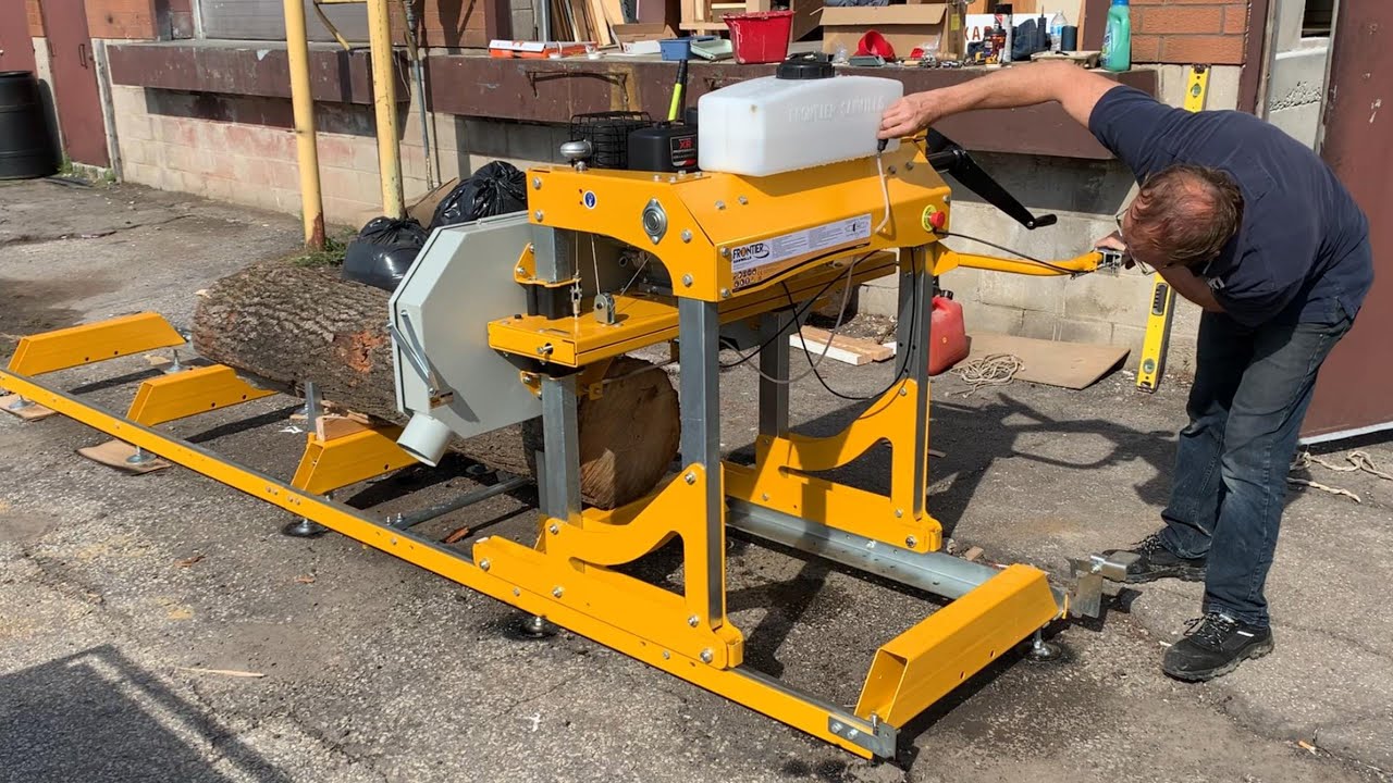 Setting up and running Frontier Sawmill for cutting up oak logs - YouTube