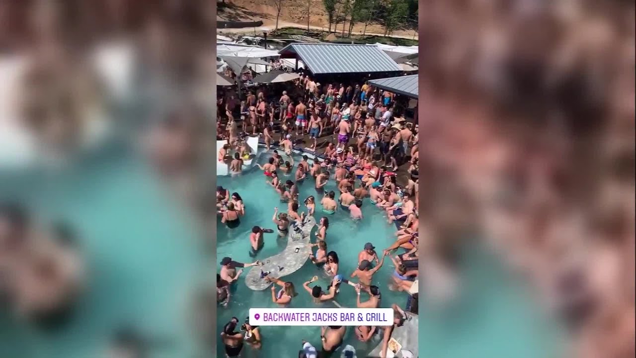 VIDEO: Crowds at massive pool party at Backwater Jacks Bar - YouTube