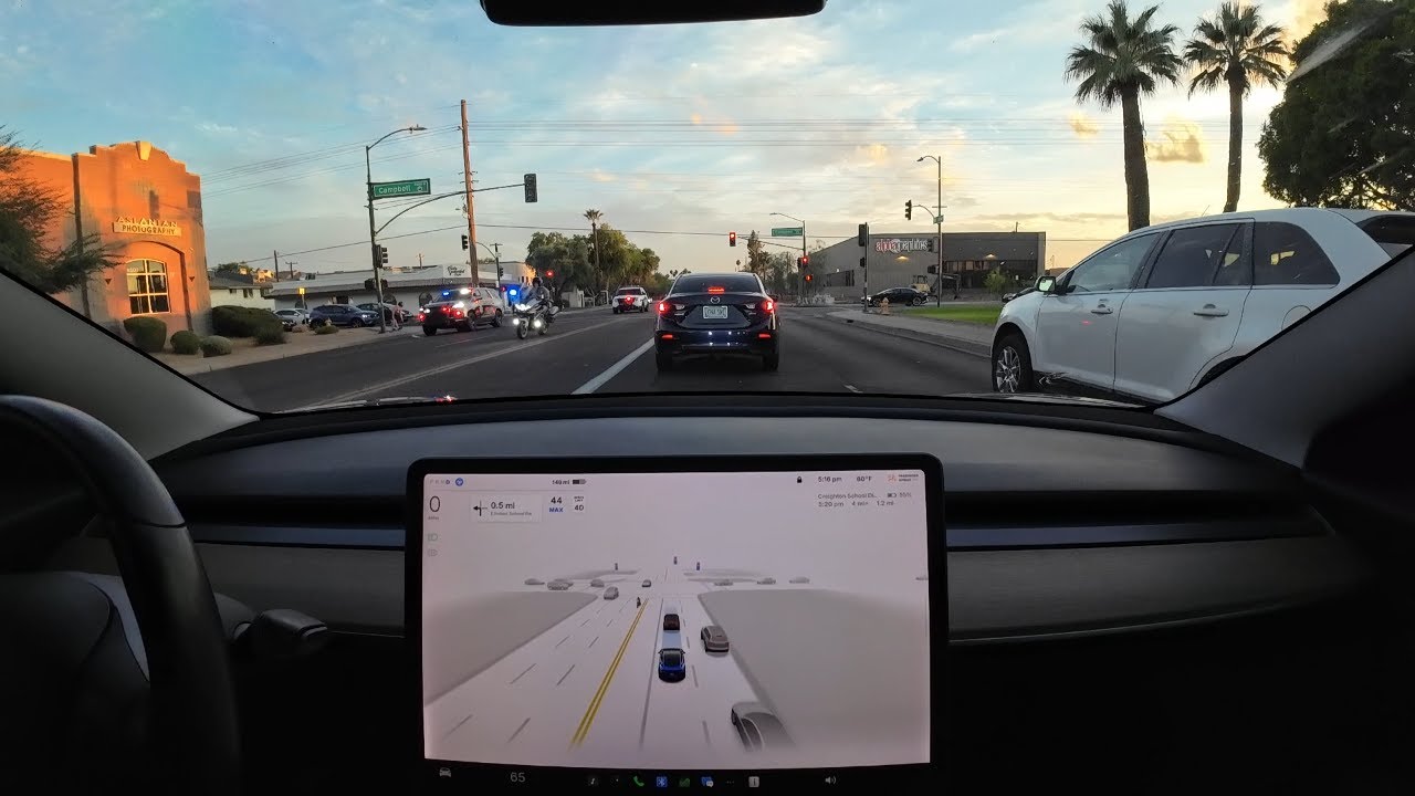 Tesla FSD 11.4.7.3 drives in uptown traffic - YouTube