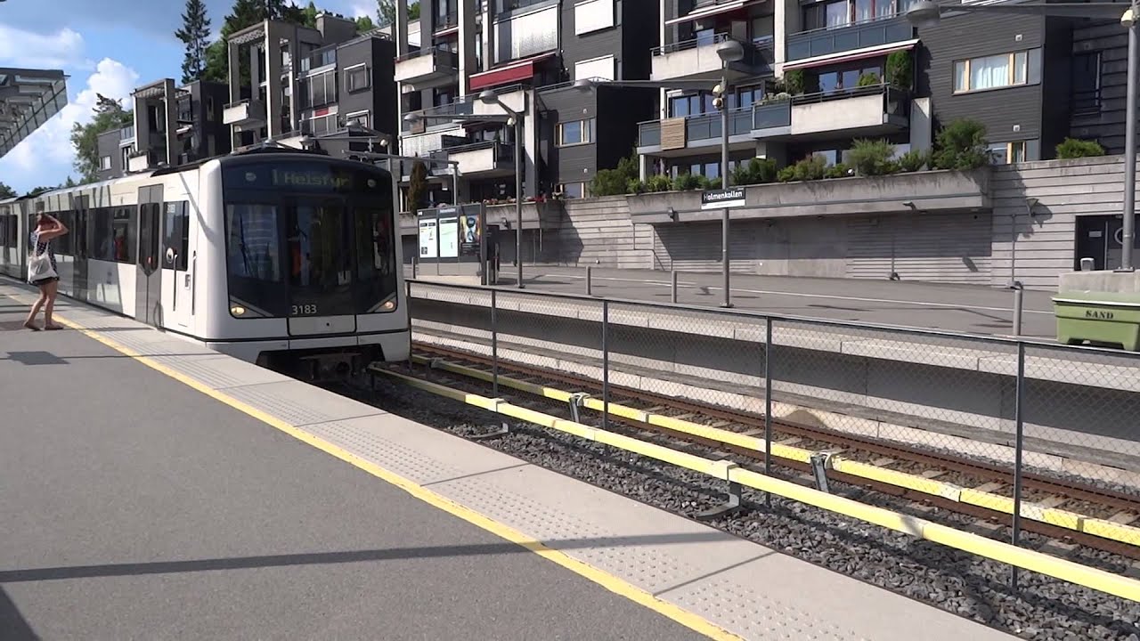 Oslo T-Bane Line 1 train arriving at Holmenkollen - YouTube