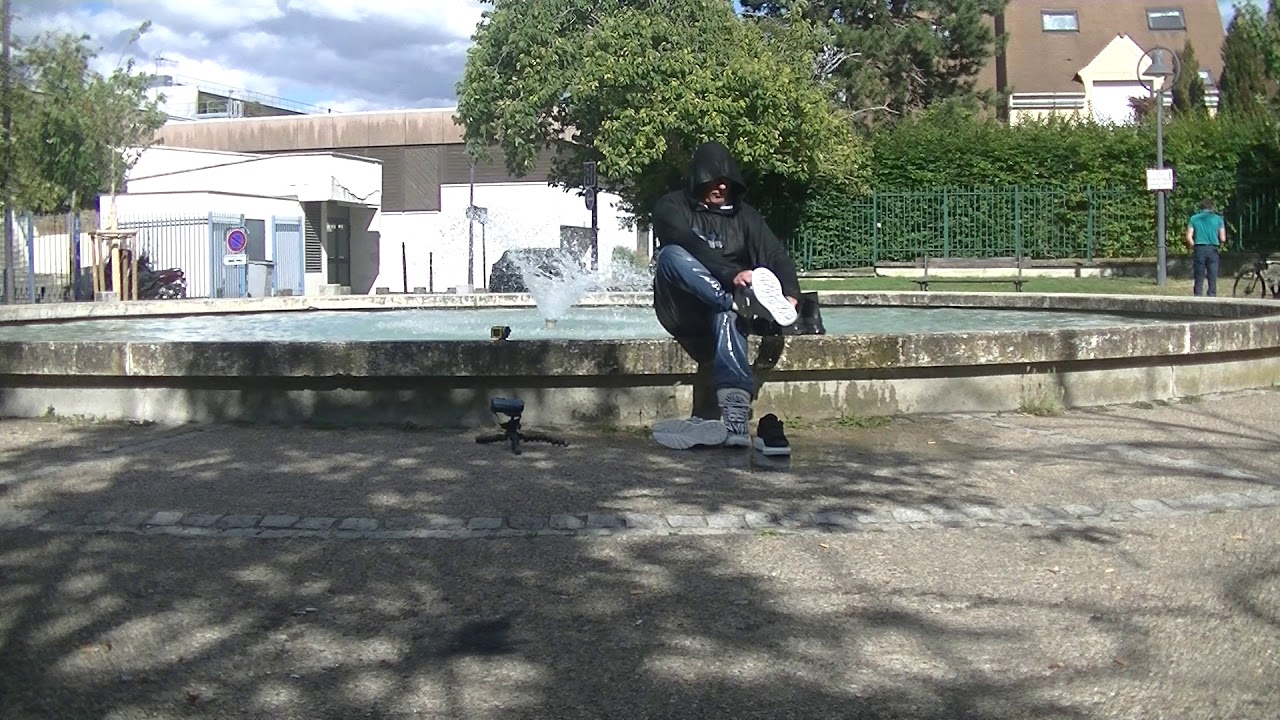 soaking fully clothed in the fountain - YouTube